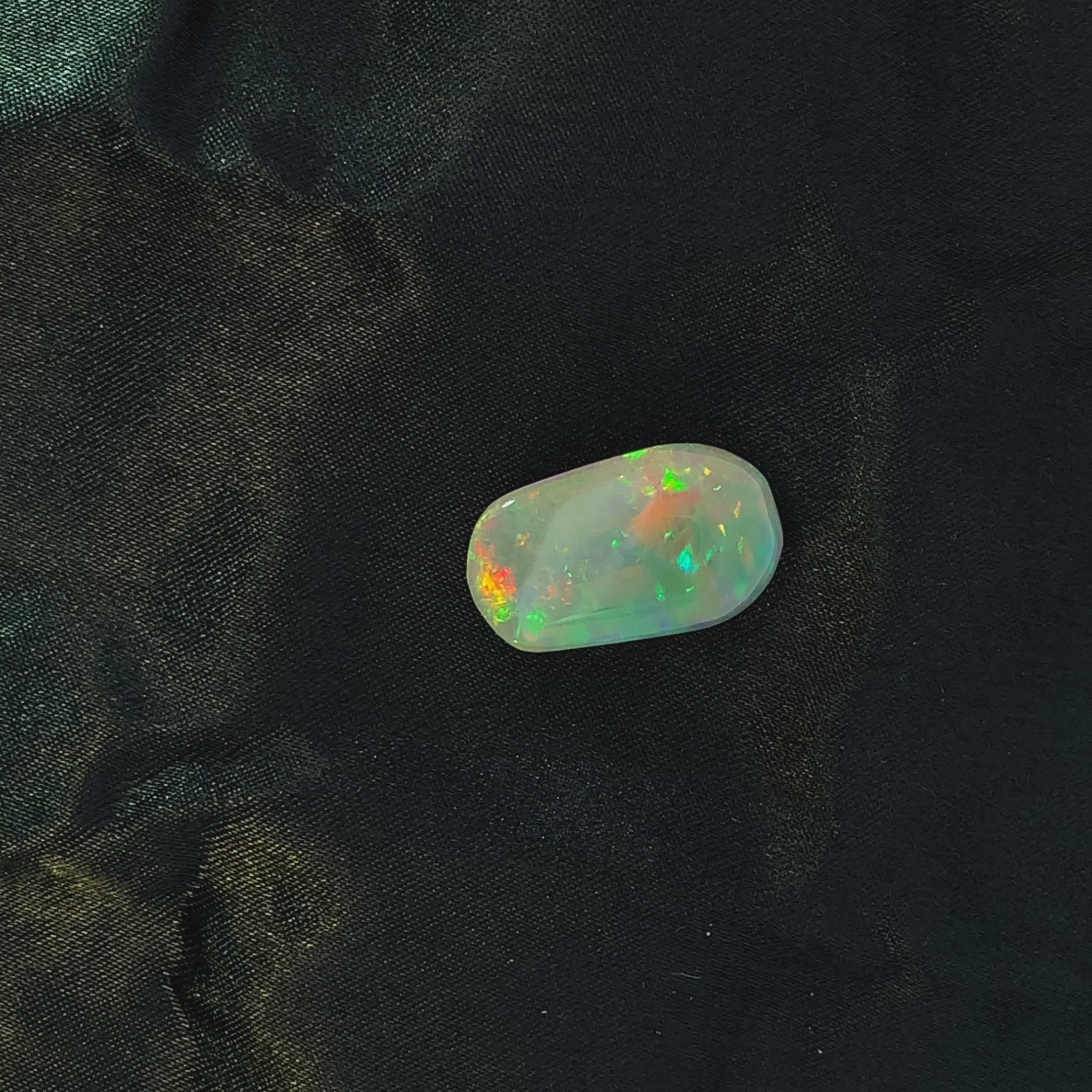 Freeform Semi-Black Opal – Celestial Gems Ltd.